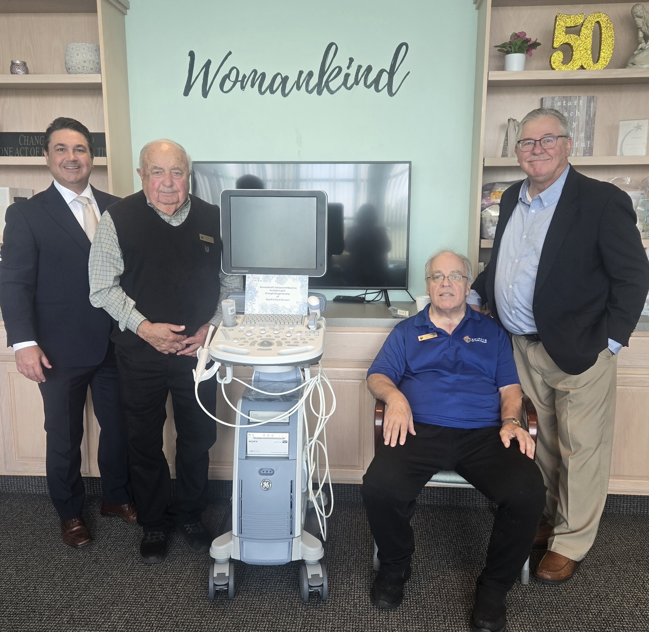 Bishop blesses Womankind ultrasound machine donated by Knights of Columbus