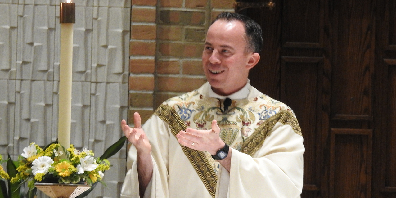 Father Jeremy Merzweiler installed as St. Francis de Sales pastor