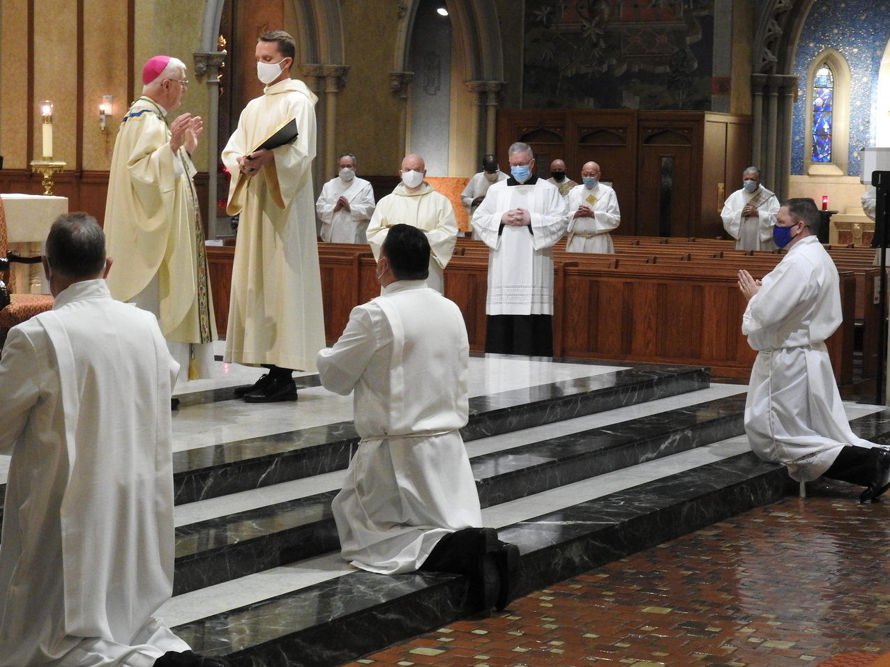 Three new permanent deacons begin their ministry of service