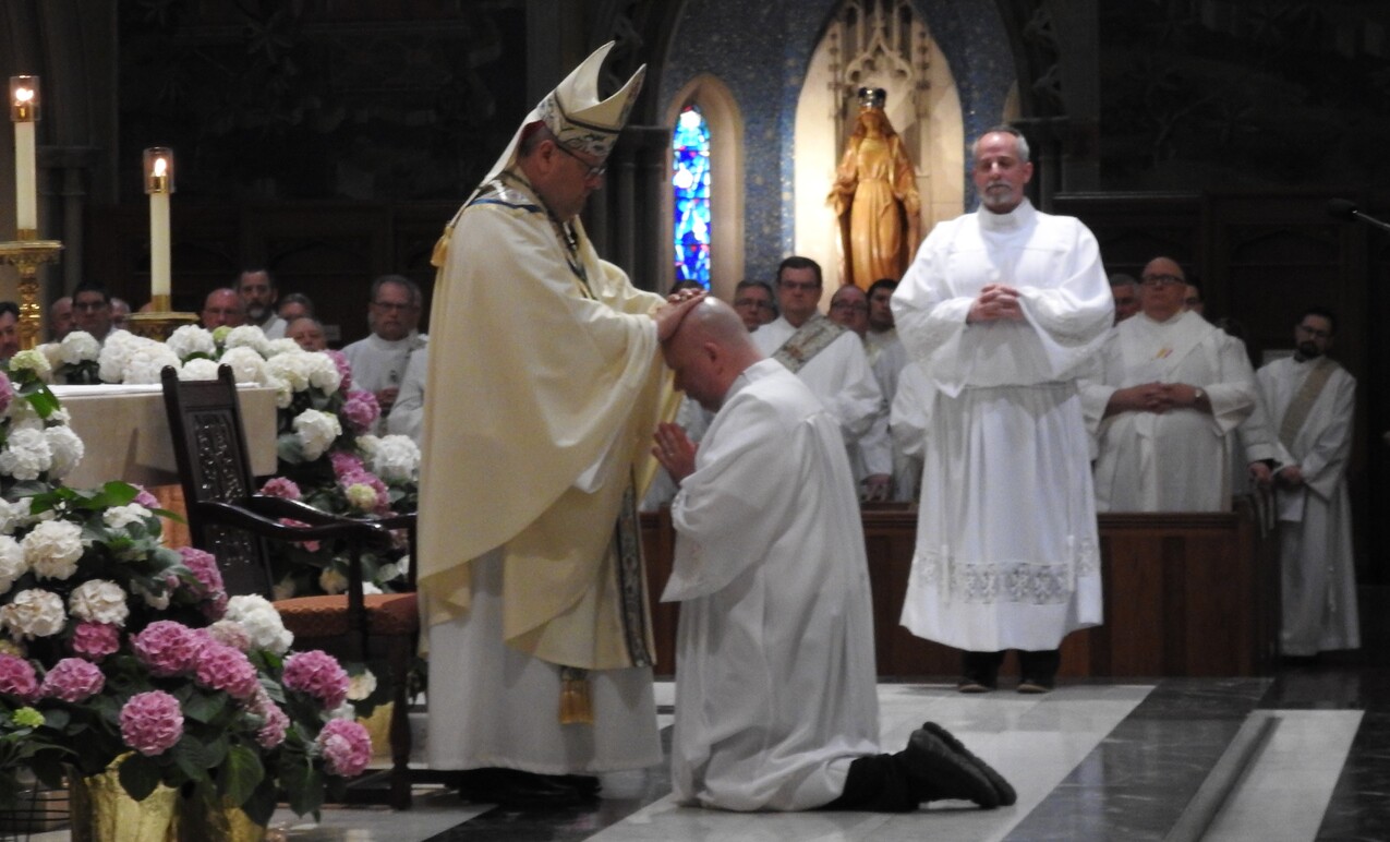 Two men ordained for ministry as permanent deacons