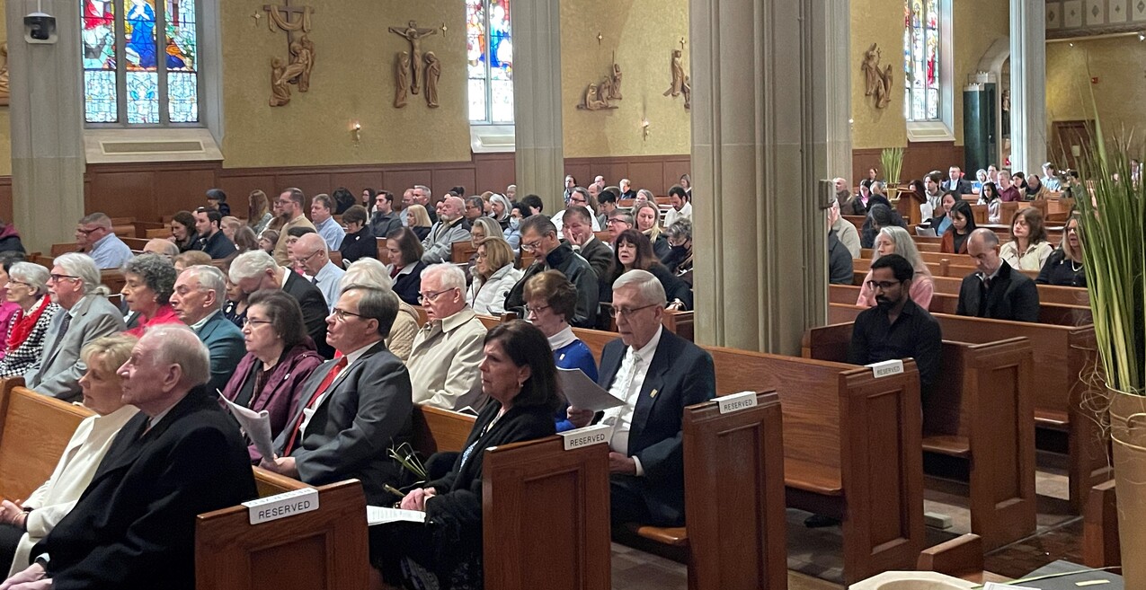 Parents of Priests attend Palm Sunday Mass, social with bishop