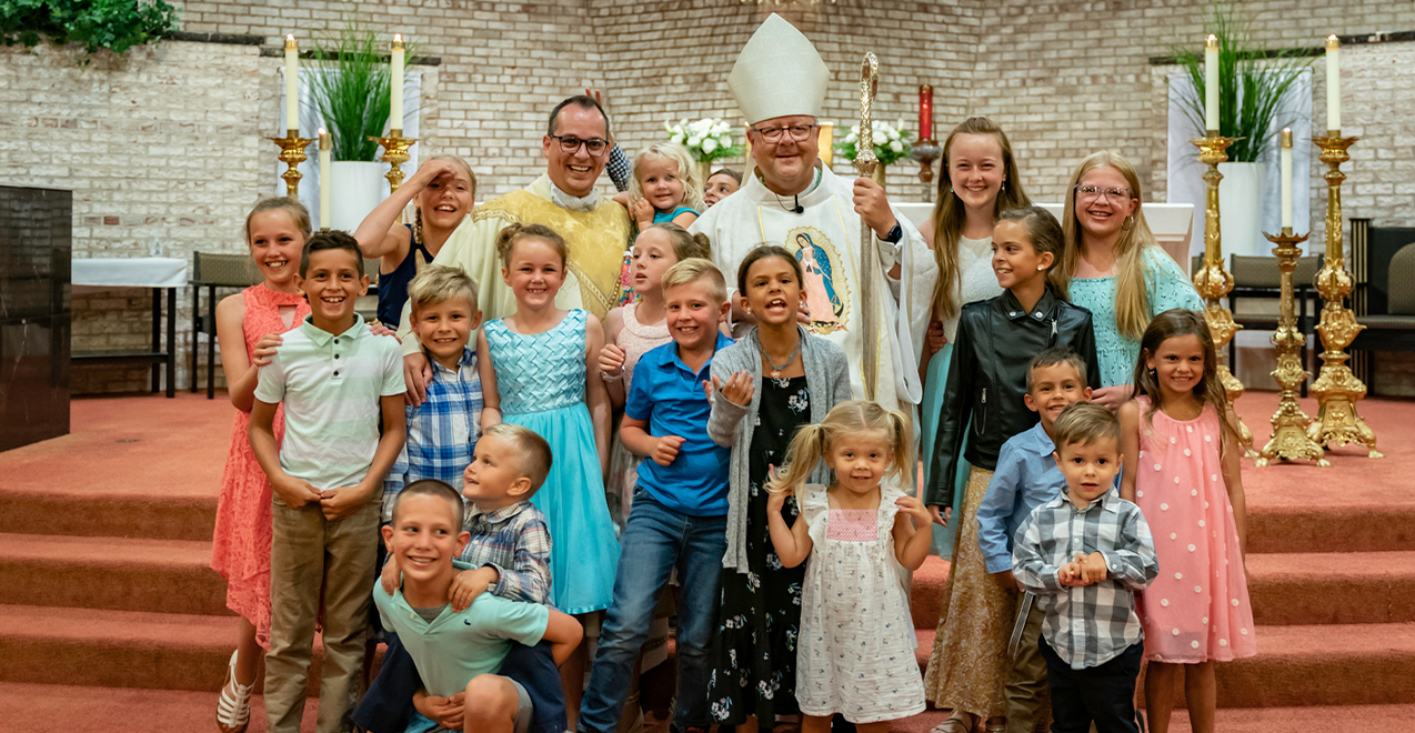 Father Ryan Mann installed as pastor of St. Basil the Great Parish