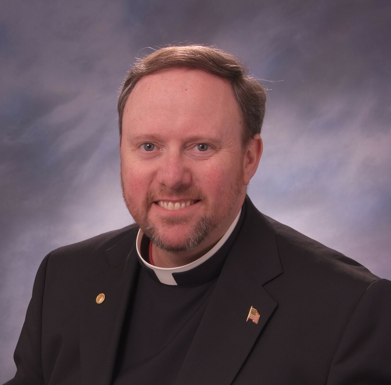 In remembrance – Father Daniel P. Redmond